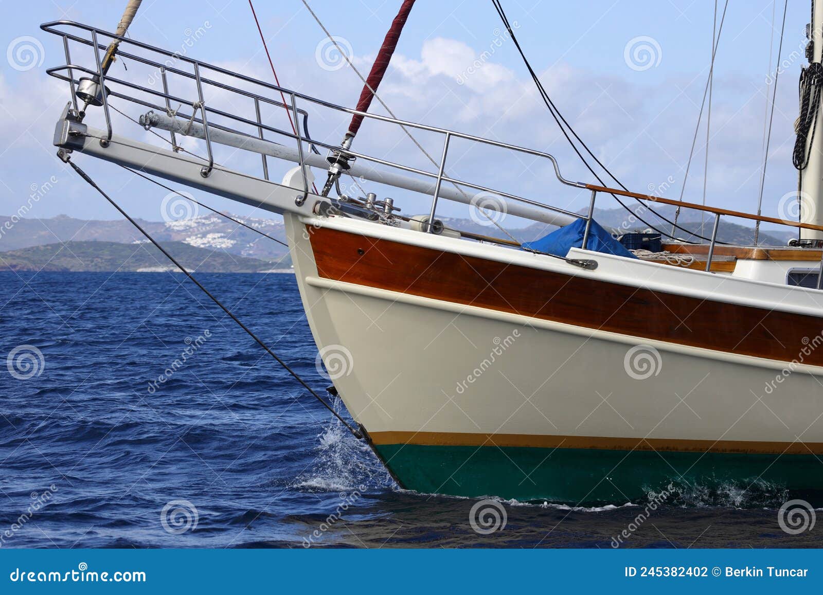 Close Up on the Bow of a Sailboat Breaking through a Wave Stock Photo ...