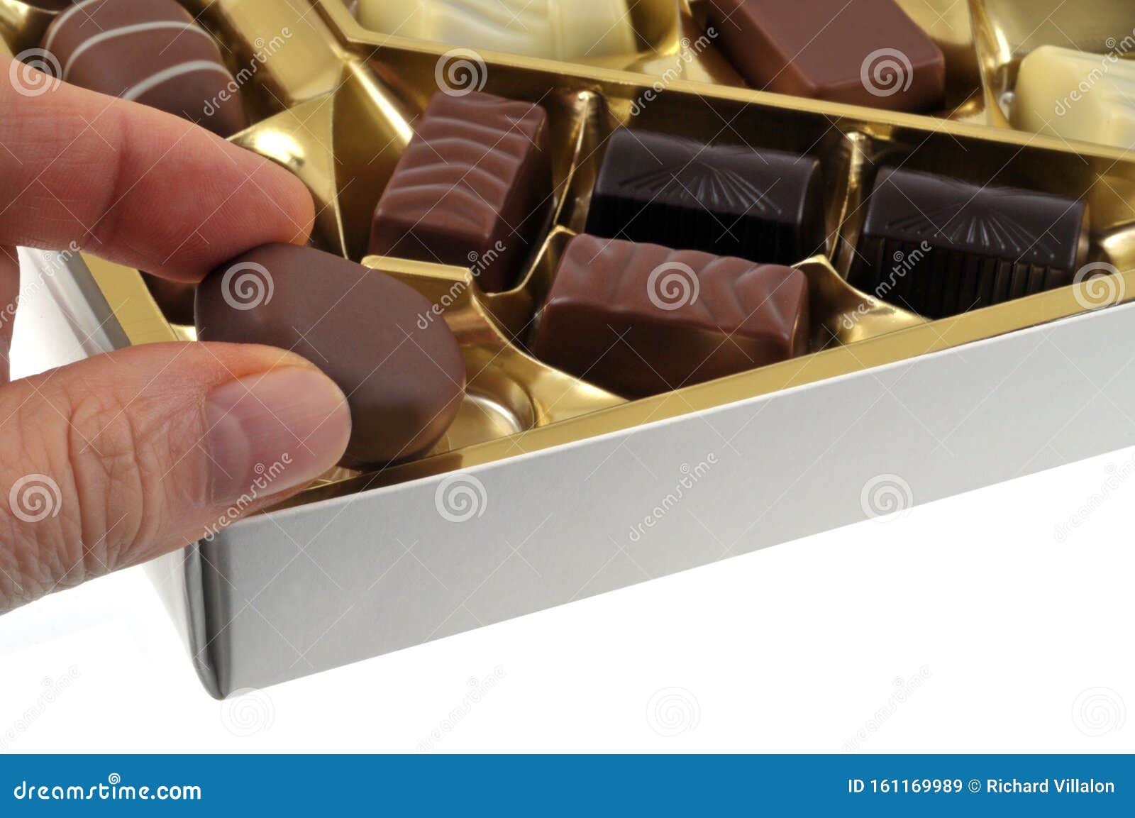 Take a chocolate in a box stock image. Image of snack - 161169989