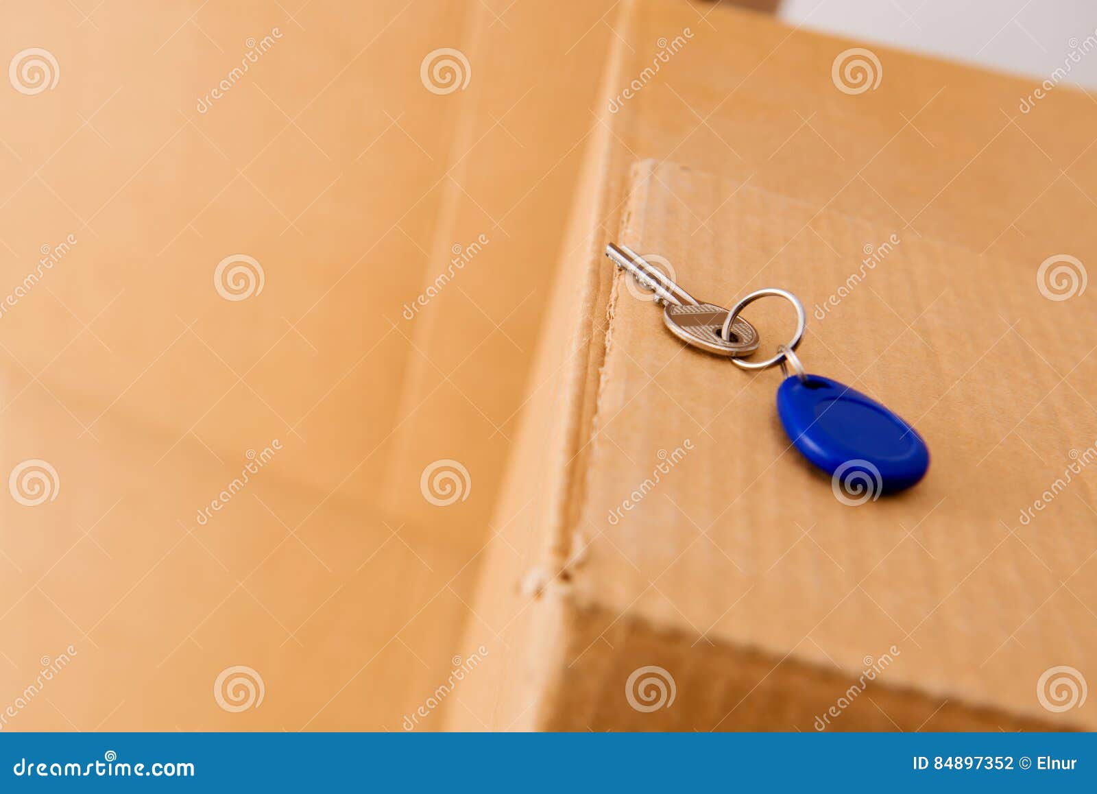 The Close Up of Boxes and Keys Stock Photo - Image of moving, office ...