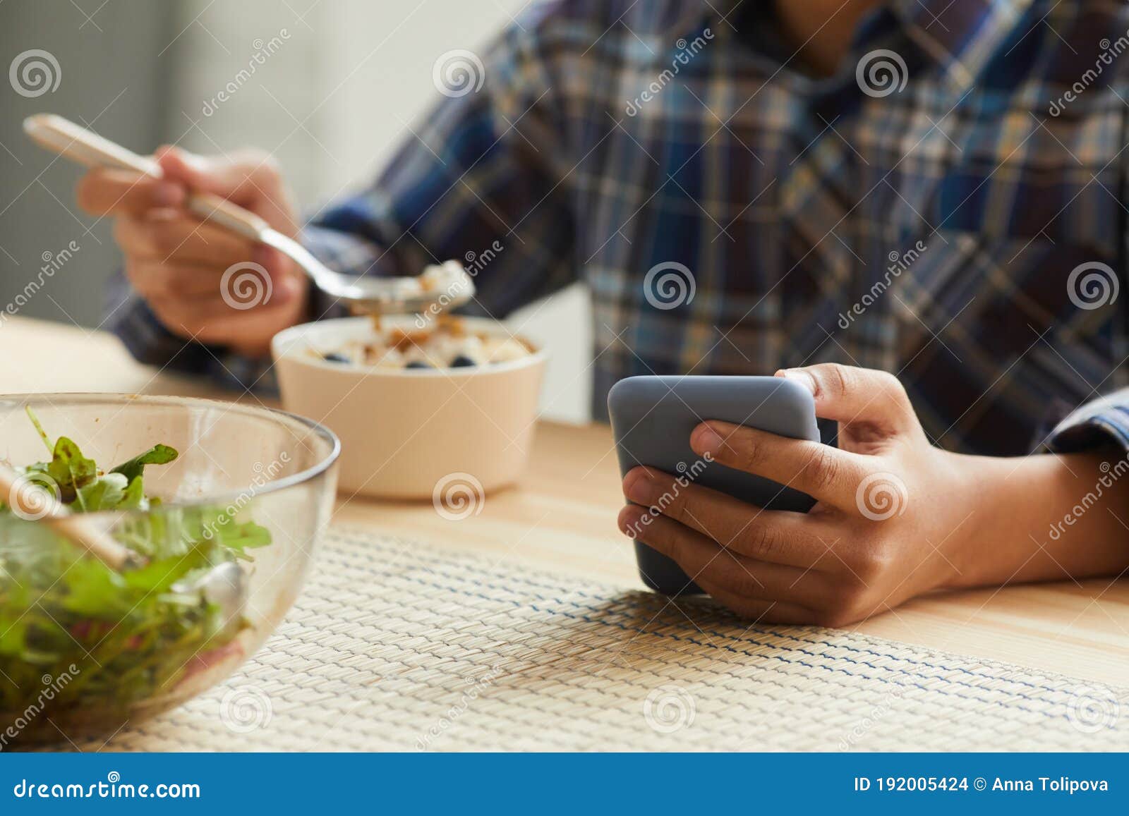 Boy Using Phone during Meal Stock Photo - Image of technology ...