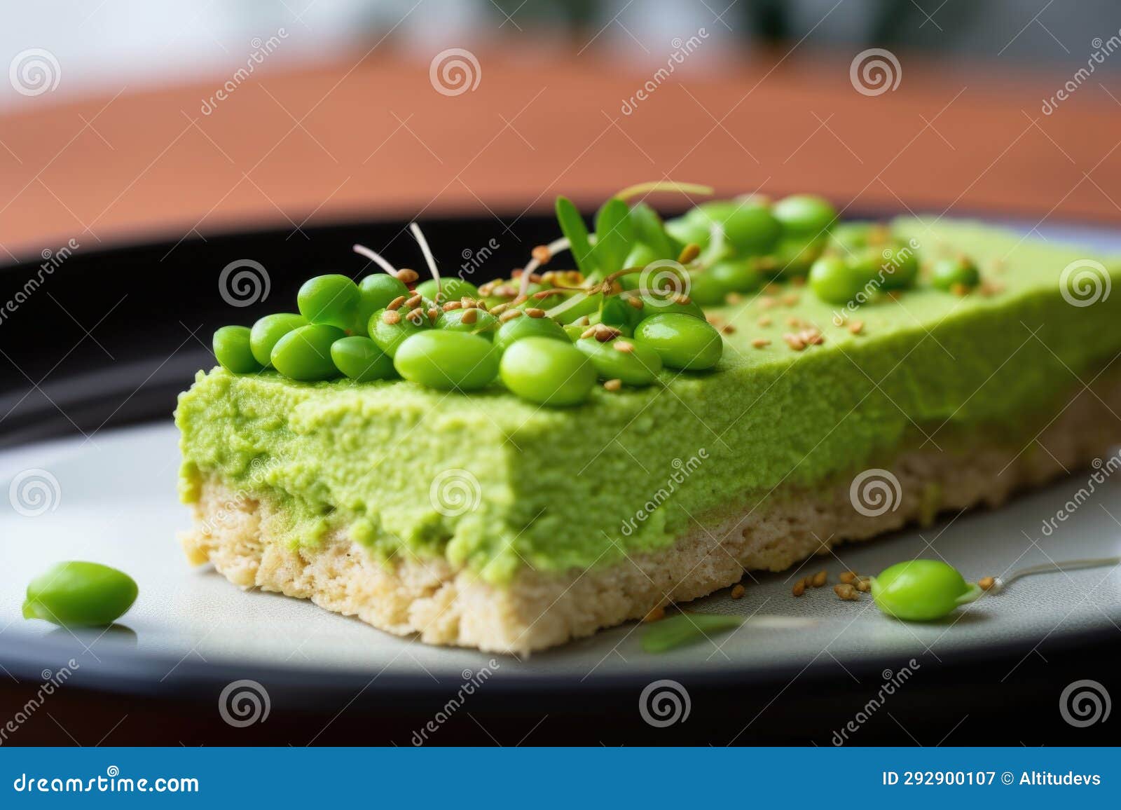 Close-up of Bread Slice Topped with Mashed Edamame on a Ceramic Dish ...