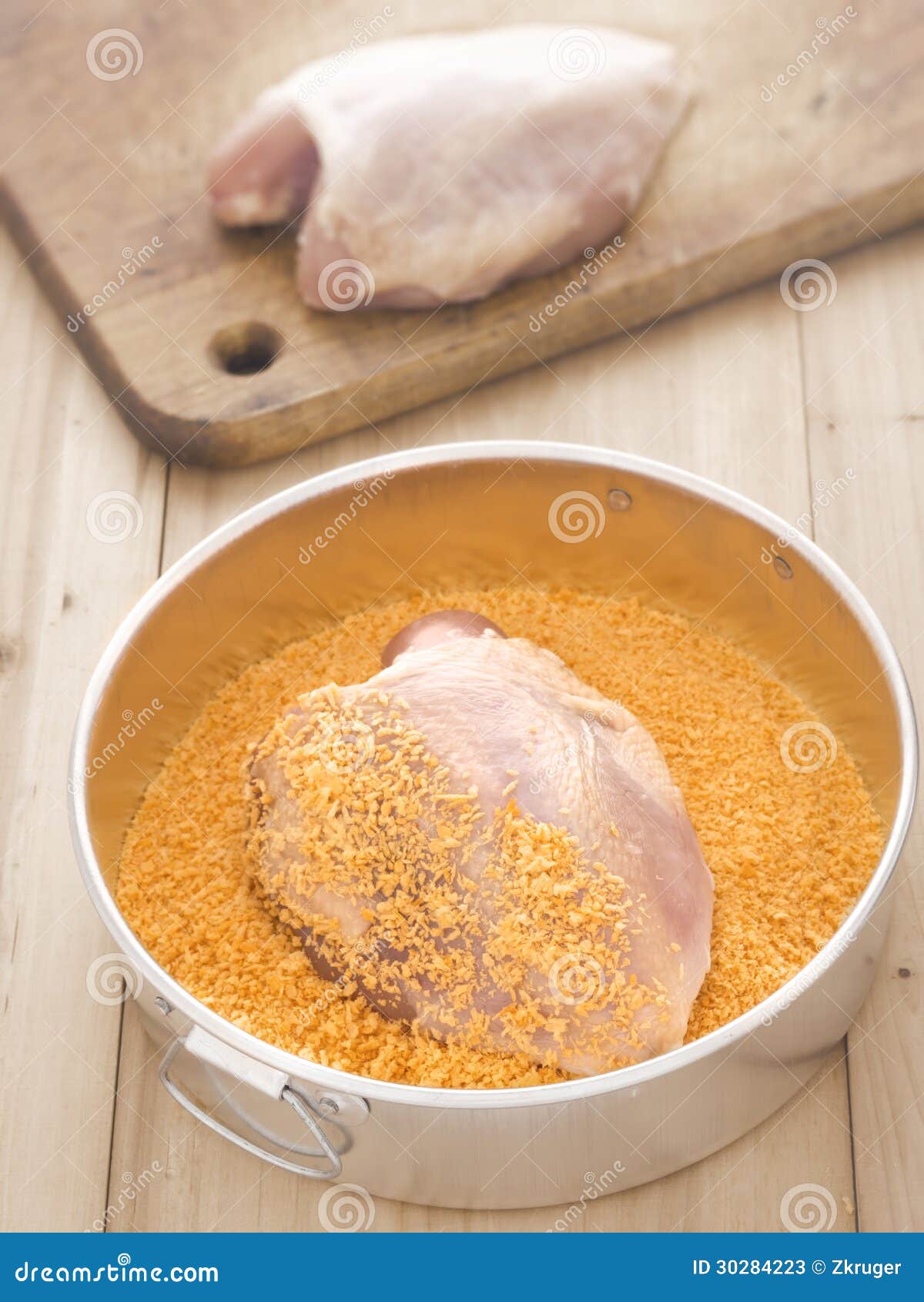 Breaded raw chicken breast stock image. Image of orange - 30284223