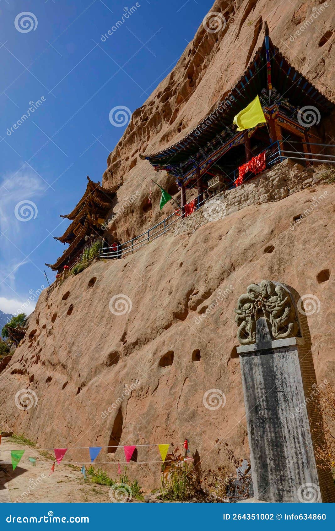 CLOSE UP Breathtaking View of Buddhist Temple Built into the Side of a ...