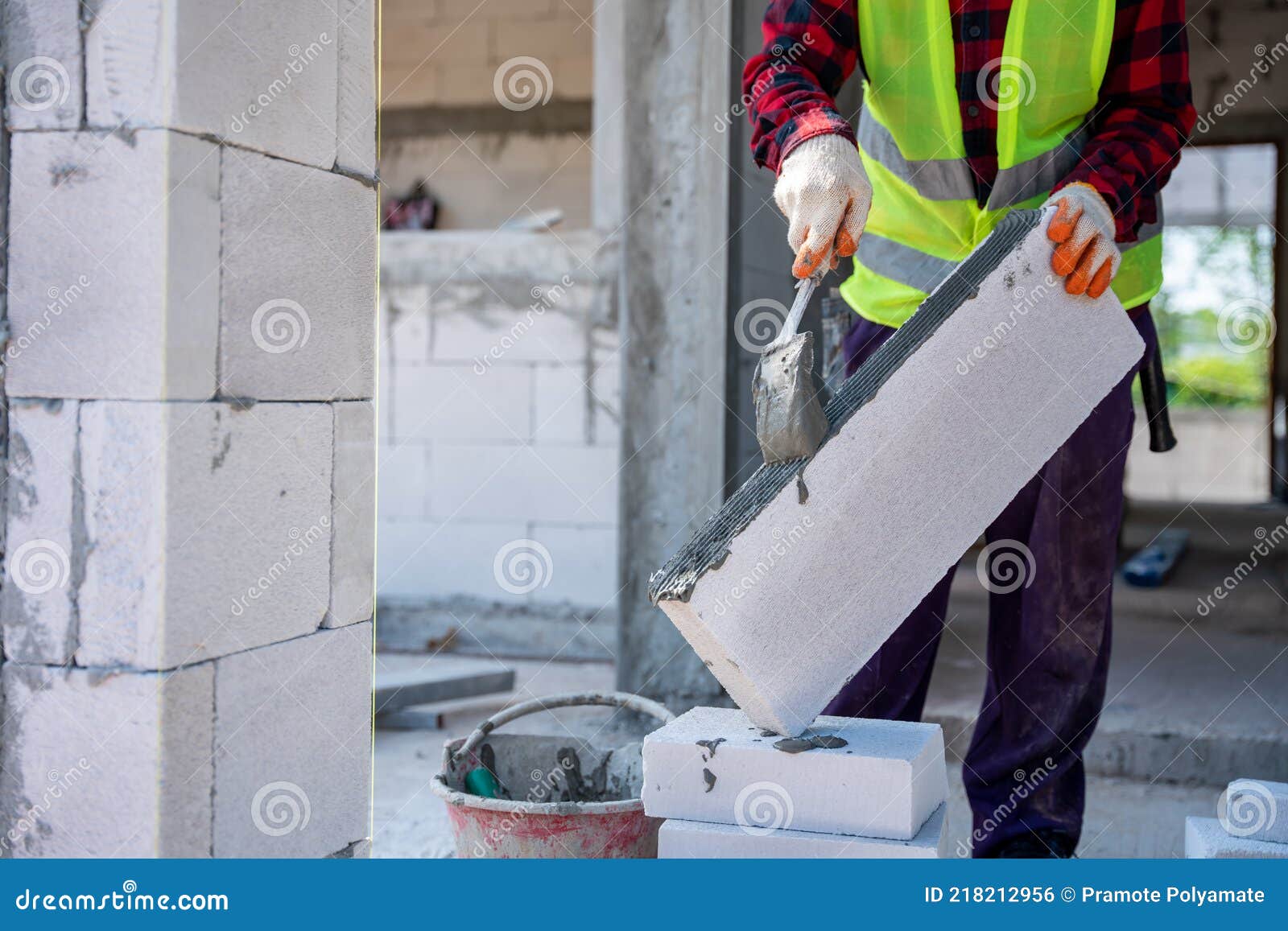 Close Up of Bricklayer Builder Using Cement Mortar To Put the ...