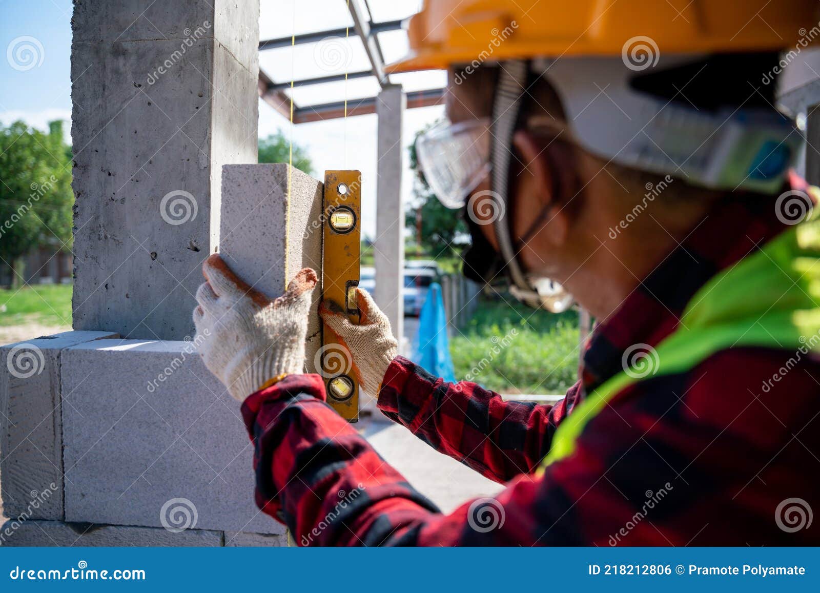 Close-up Bricklayer Builder Using the Water Level, Check the ...
