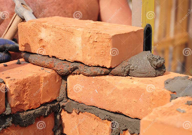 Close Up on Bricklayer Hands Laying Bricks. Stock Image - Image of ...