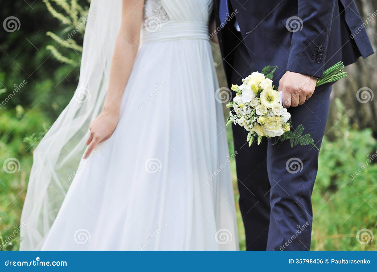 Close Up of Bride and Groom Hands. Wedding Bouquet Stock Photo - Image ...