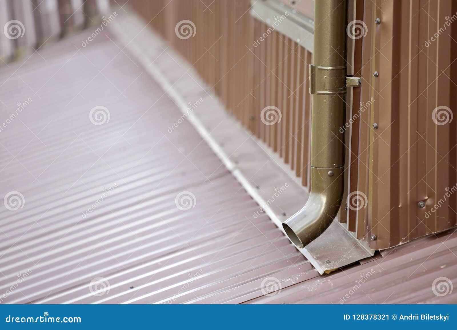Close-up of Brown New Gutter Metal System Pipe on Wall. Drain Pr Stock ...
