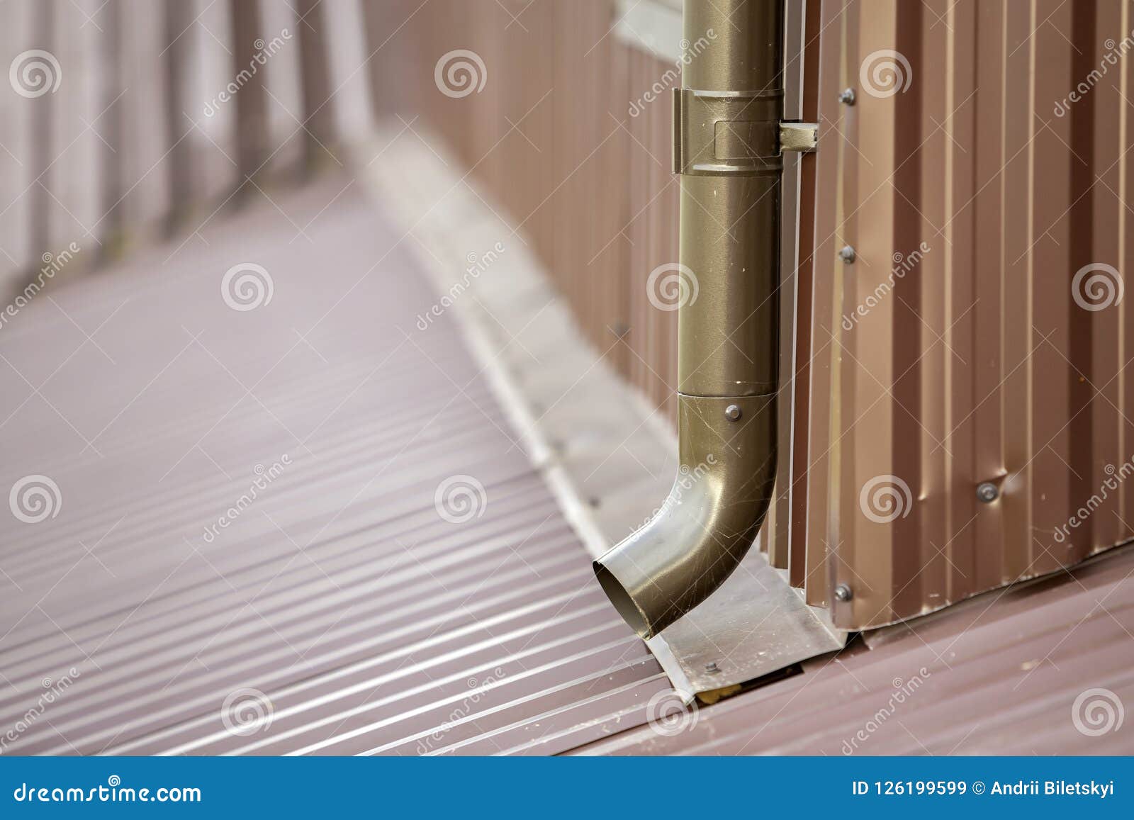 Close-up of Brown New Gutter Metal System Pipe on Wall. Drain Pr Stock ...