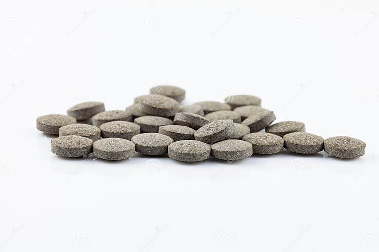 Brown Tablets on White Surface Stock Image - Image of pharmaceutical ...