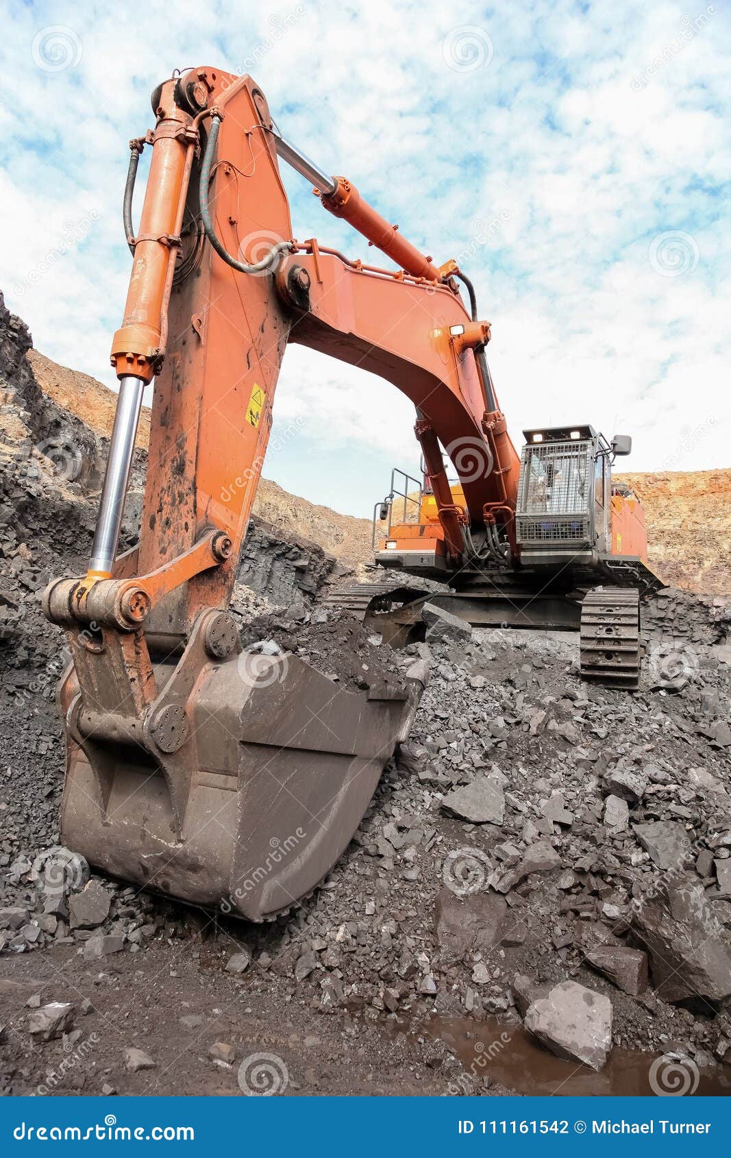 Close Up of the Scoop of an Excavator Digging Ore Rocks Stock Photo ...