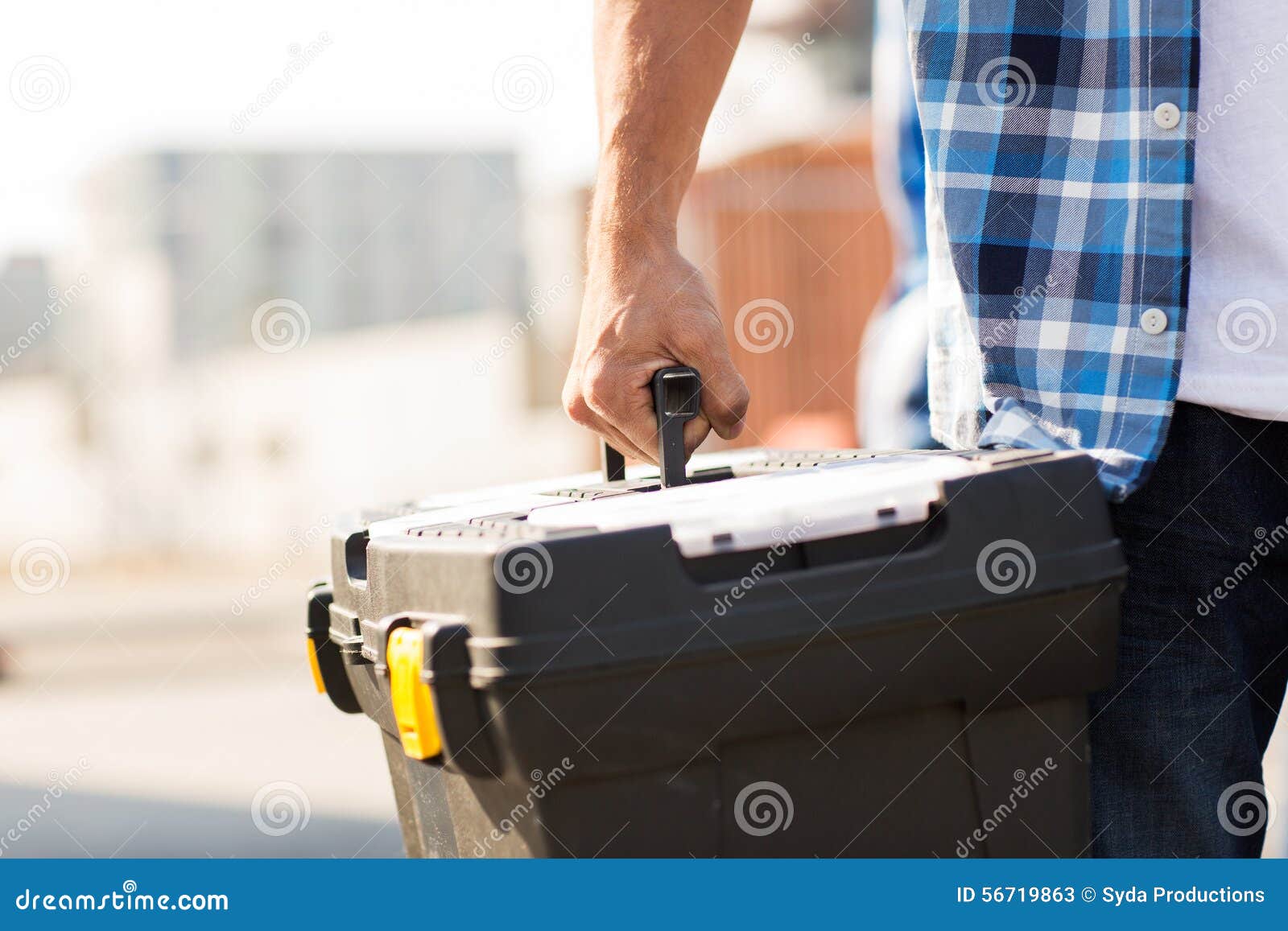 Close Up of Builder Carrying Toolbox Outdoors Stock Image - Image of ...