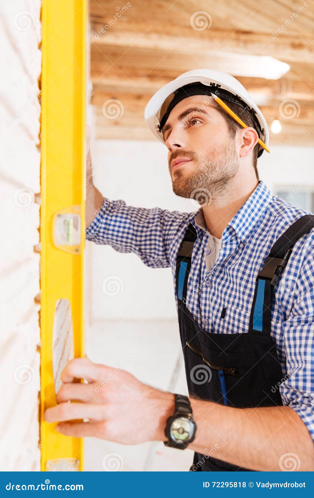 Close-up of a Builder Checking Level on the Wall Stock Photo - Image of ...