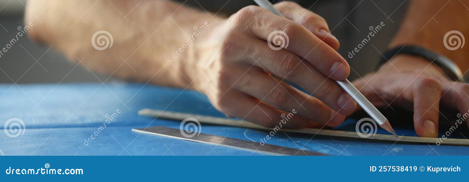 Builder Man Hand Holding Pencil and Make Corrections on Building Plan ...