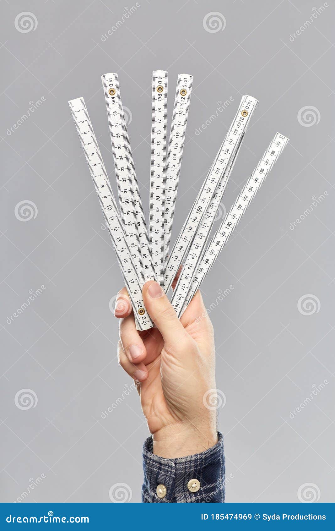 Close Up of Builder`s Hand Holding Folding Ruler Stock Image - Image of ...