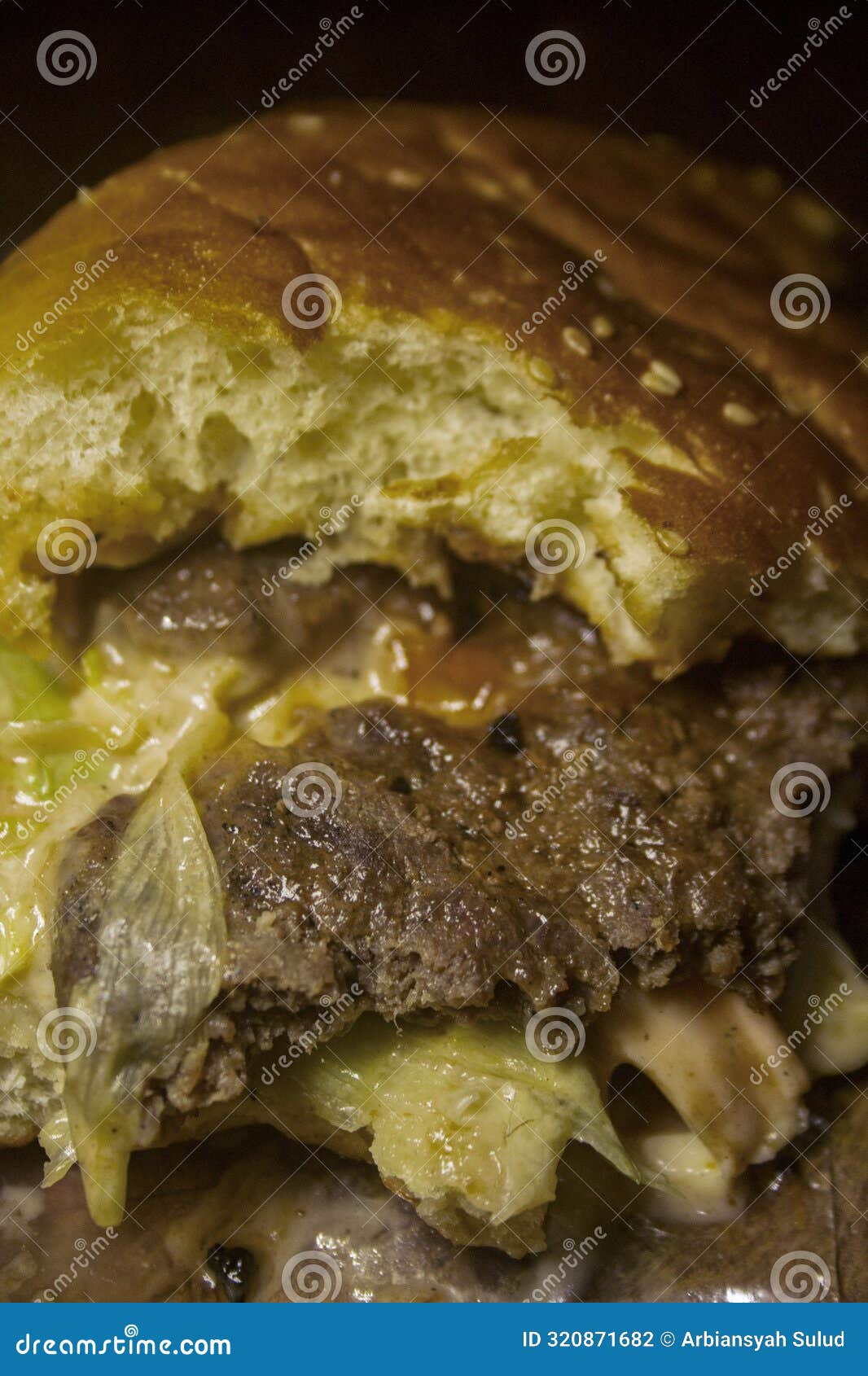 Close Up of Burger and Beef in a Dark Room Stock Photo - Image of ...