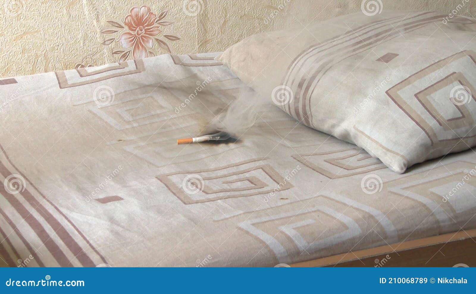 Close Up Burning Cigarette with Smoke in the Bedroom on the Bed Leads ...