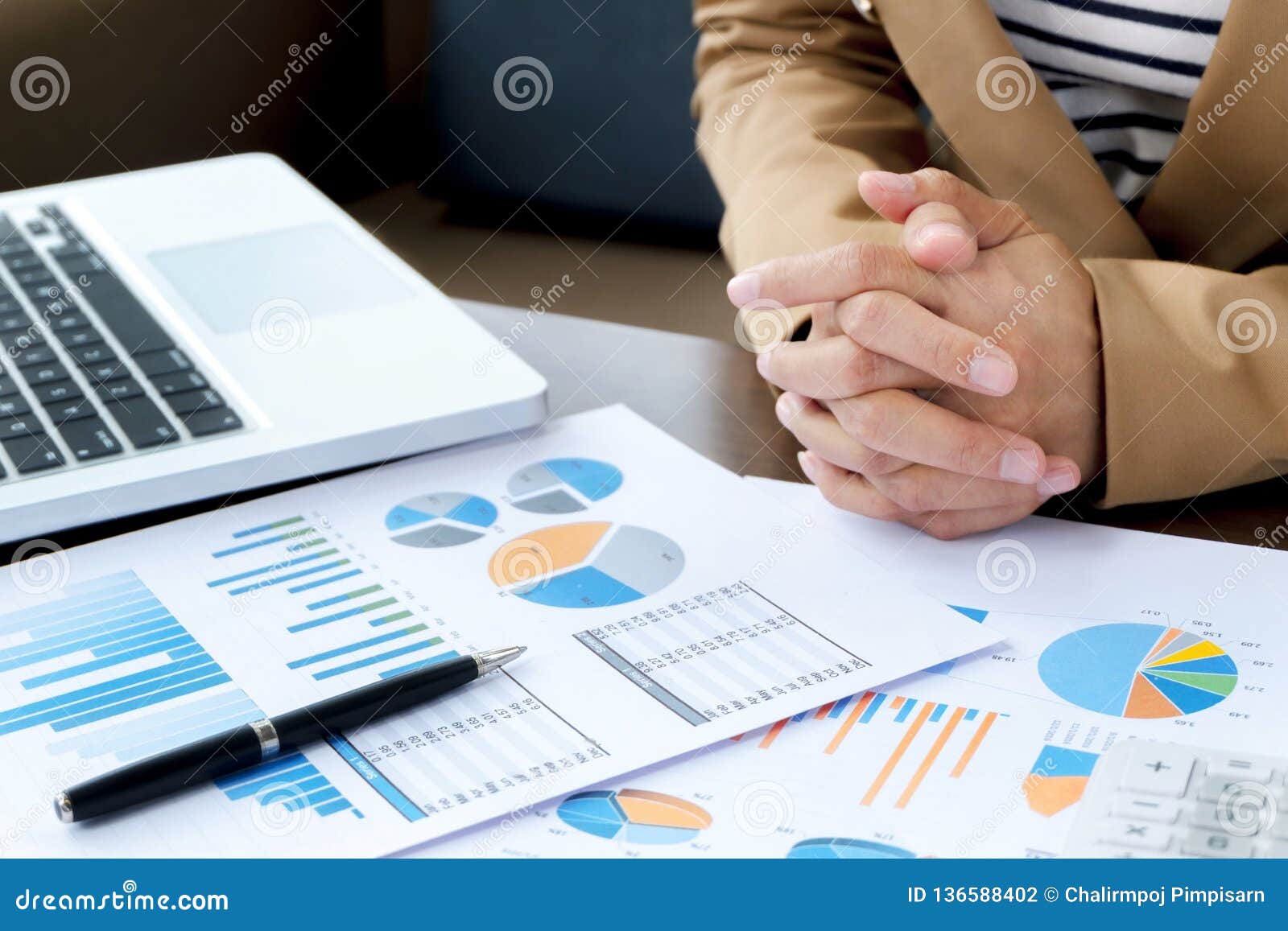 Close Up Business Executive Working with Laptop an Data Documents in ...