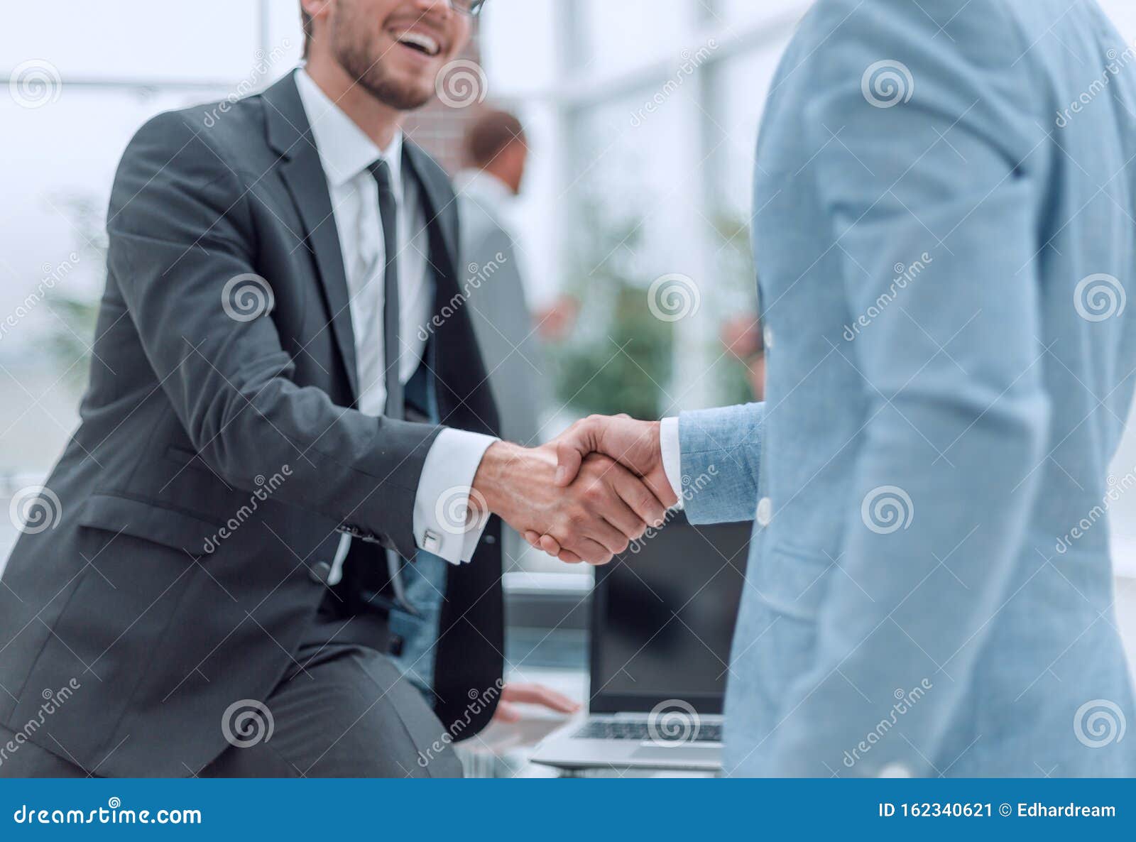 Close Up. Business Handshake on the Background of the Office Stock ...