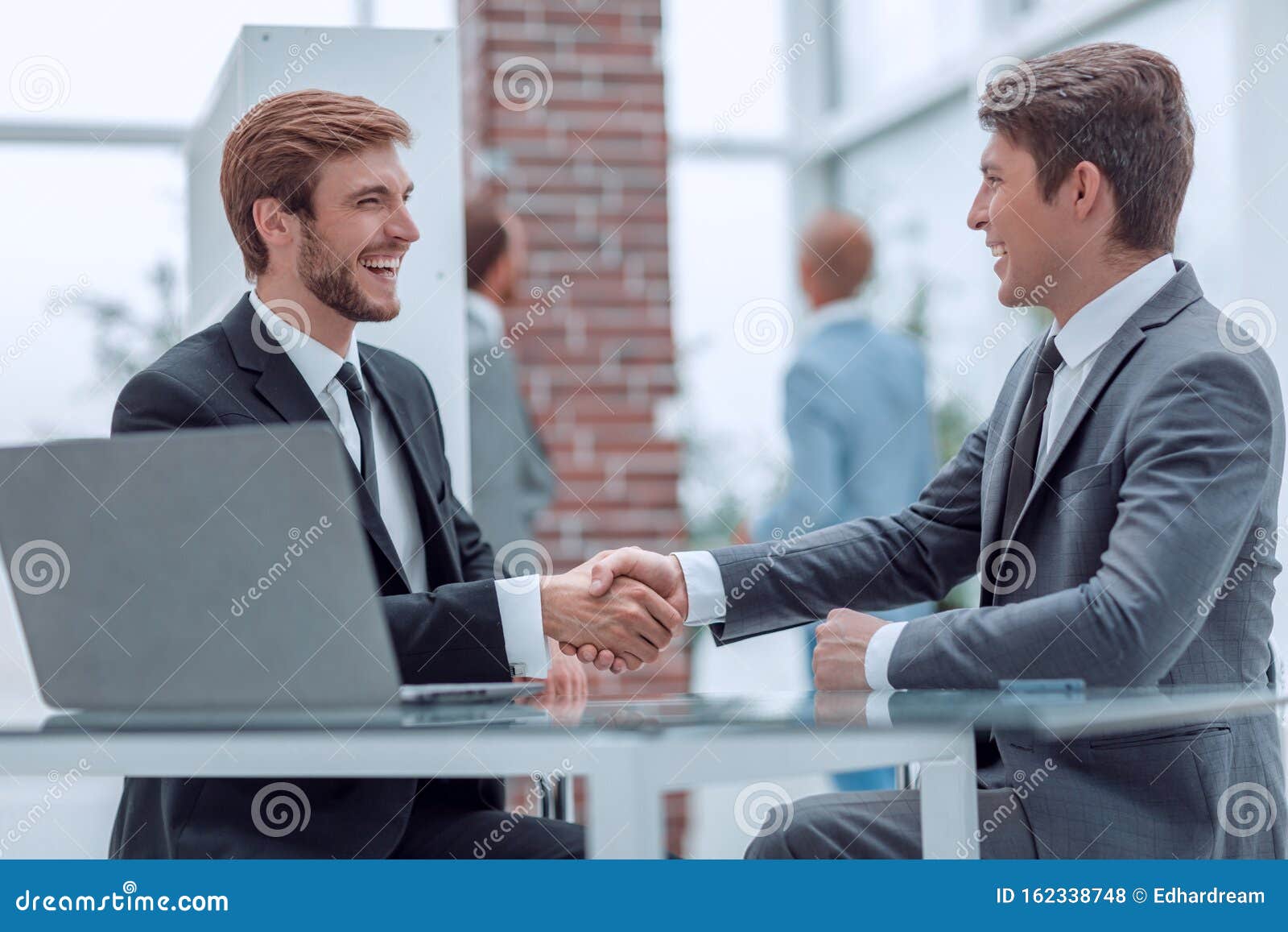 Close Up. Business Handshake at the Negotiating Table Stock Photo ...