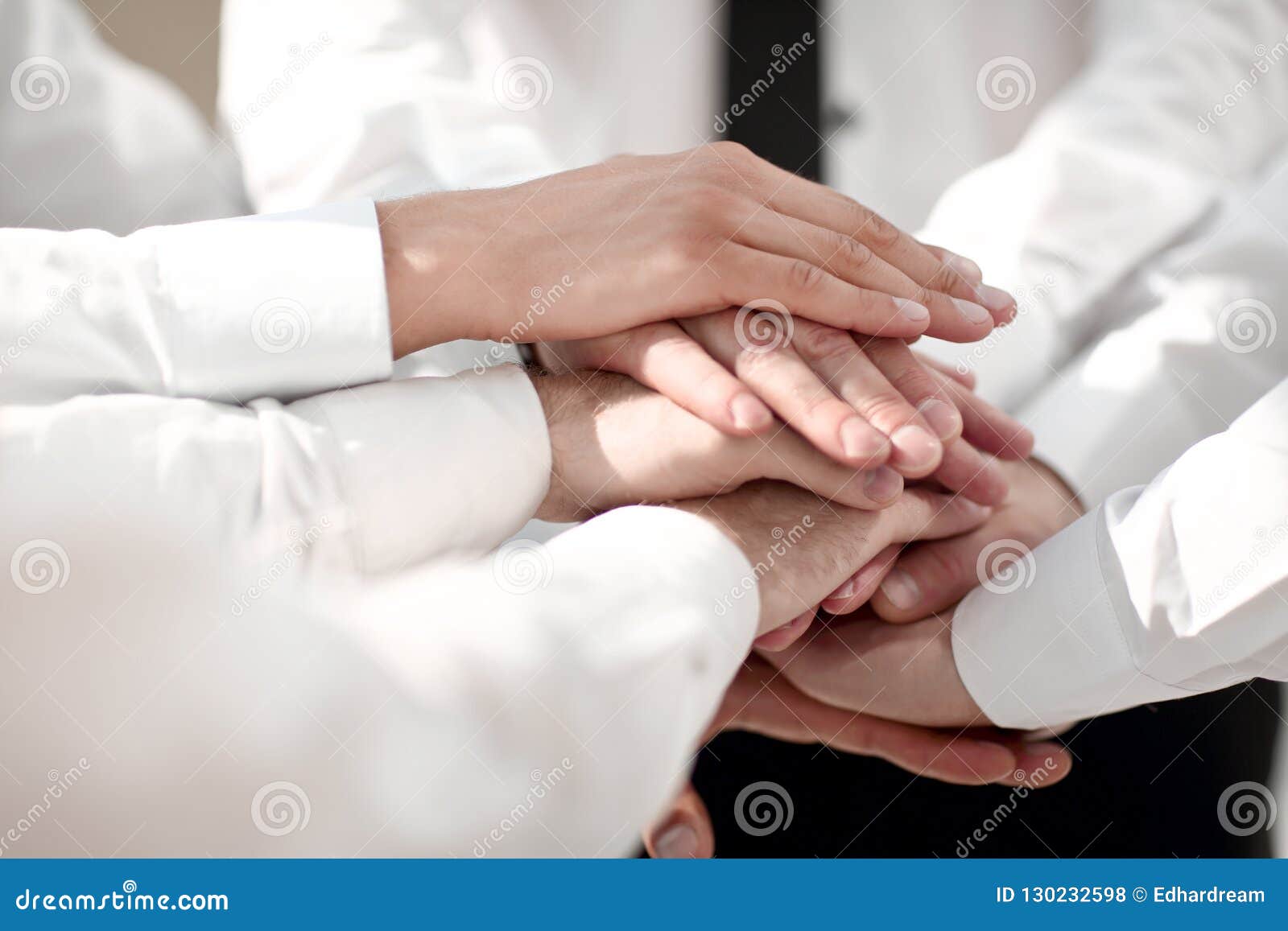 Close Up. Business People with a Stack of Hands Stock Photo - Image of ...