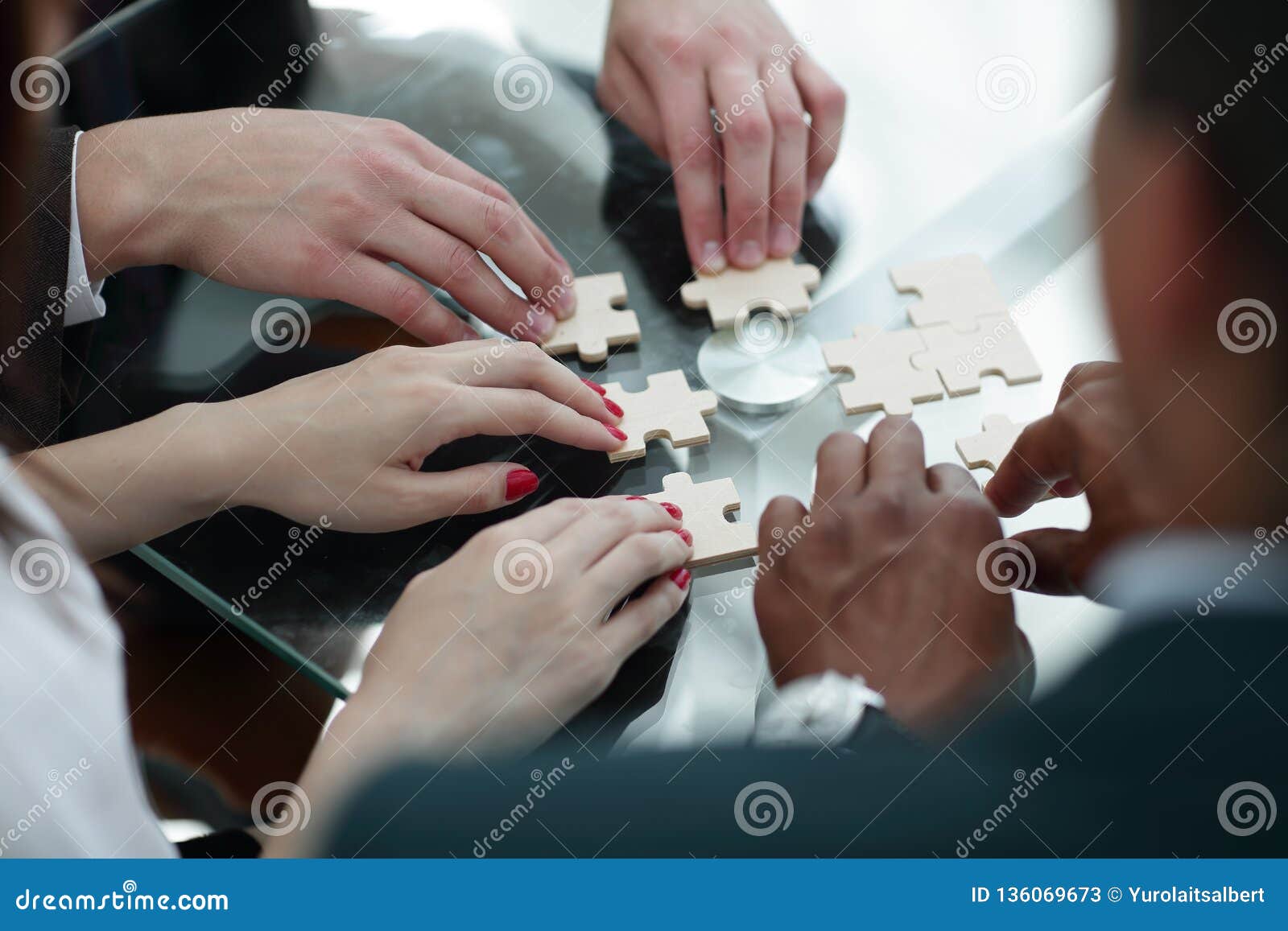 Close Up. Business Team Assembling Puzzle Pieces. Stock Image - Image ... Close Up. Business Team Assembling Puzzle Pieces. Stock Image - Image ...