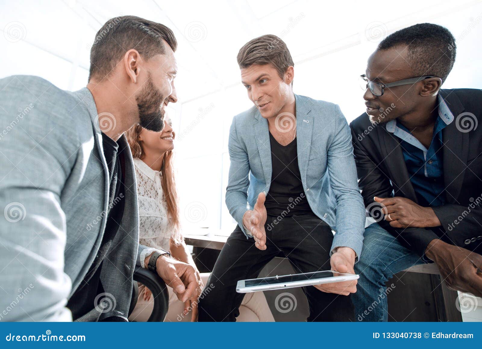 Close Up.the Business Team is Discussing New Information Stock Photo ... Close Up.the Business Team is Discussing New Information Stock Photo ...