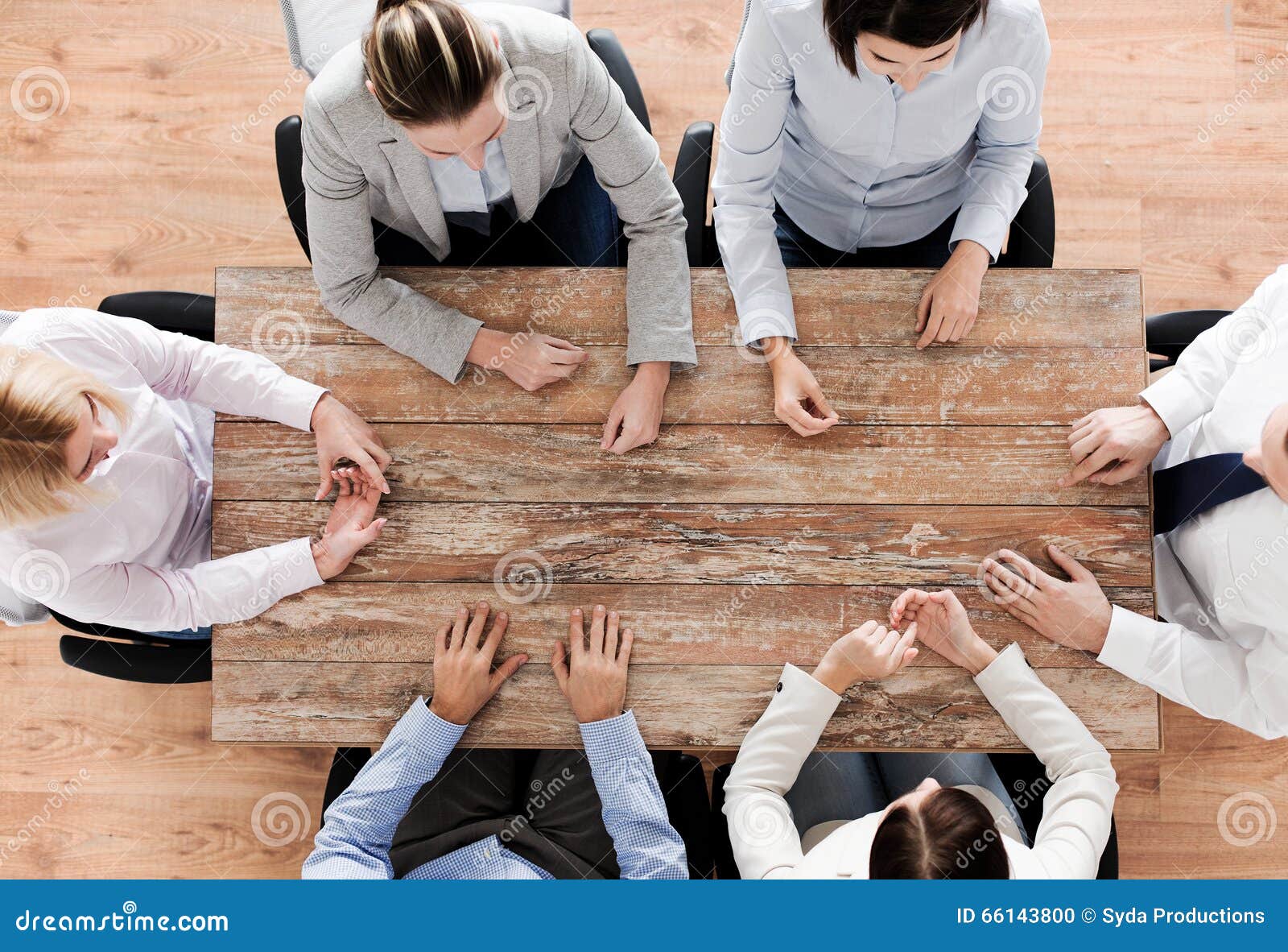 Close Up of Business Team Sitting at Table Stock Photo - Image of ...