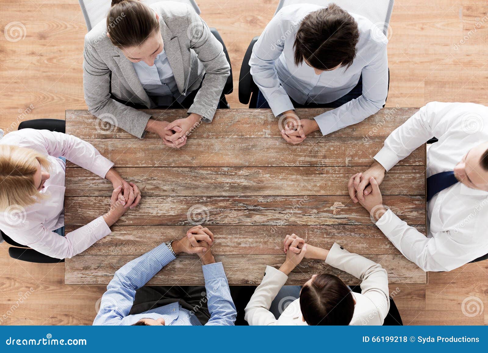Close Up of Business Team Sitting at Table Stock Photo - Image of ...