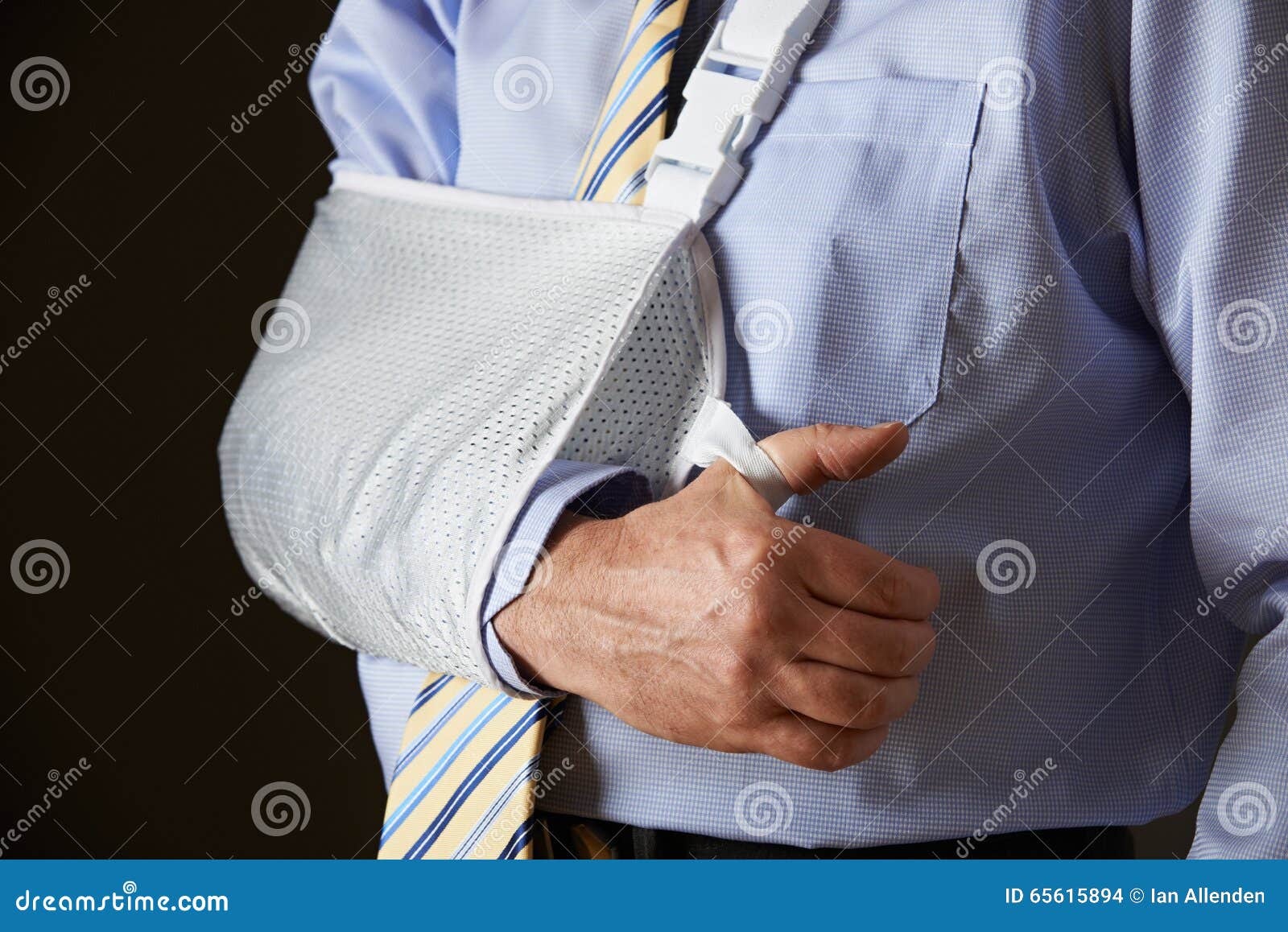 Close Up of Businessman with Arm in Sling Stock Photo - Image of ...