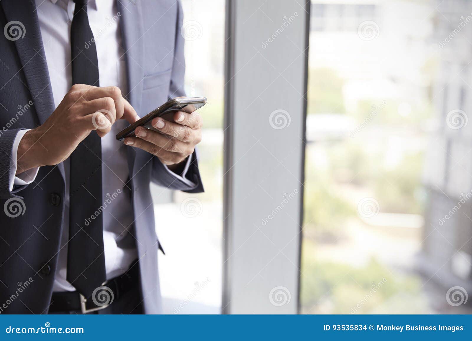 Close Up of Businessman Checking Messages on Mobile Phone Stock Photo ...