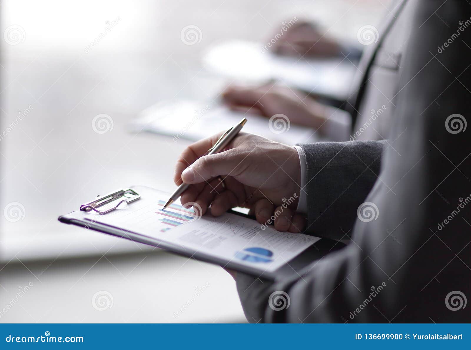 Close Up. Businessman with Clipboard Checking Statistics Stock Photo ...