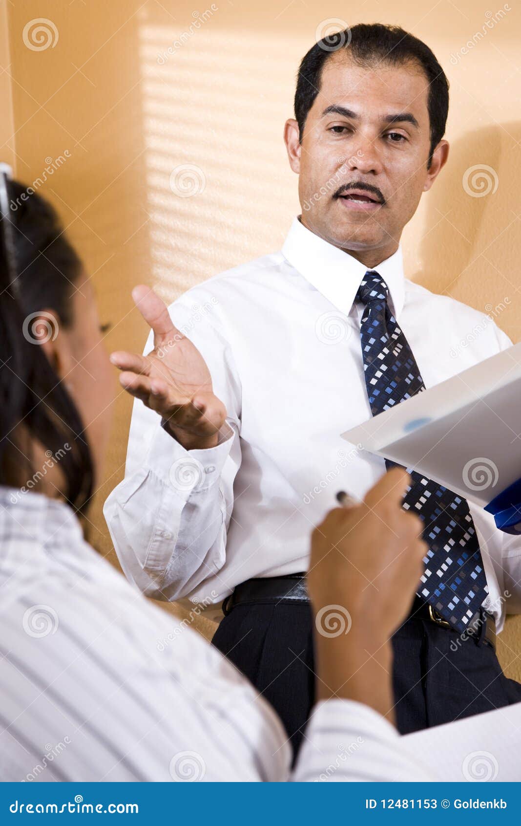 Close-up of Businessman Conversing with Co-worker Stock Image - Image ...