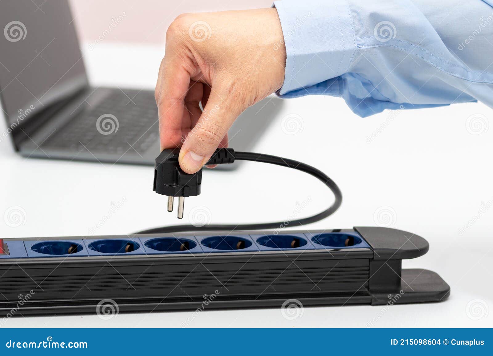 Man hand plugging electric stock photo. Image of connection - 215098604