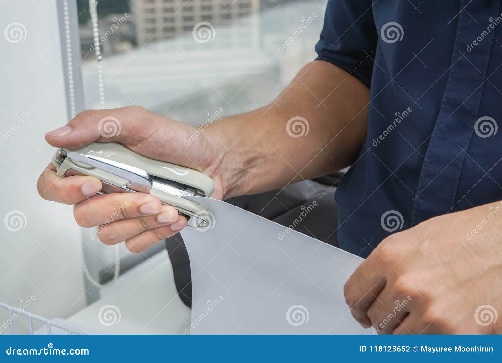 A Stapler And The Documents Files In Office On The Table, Staple The ...
