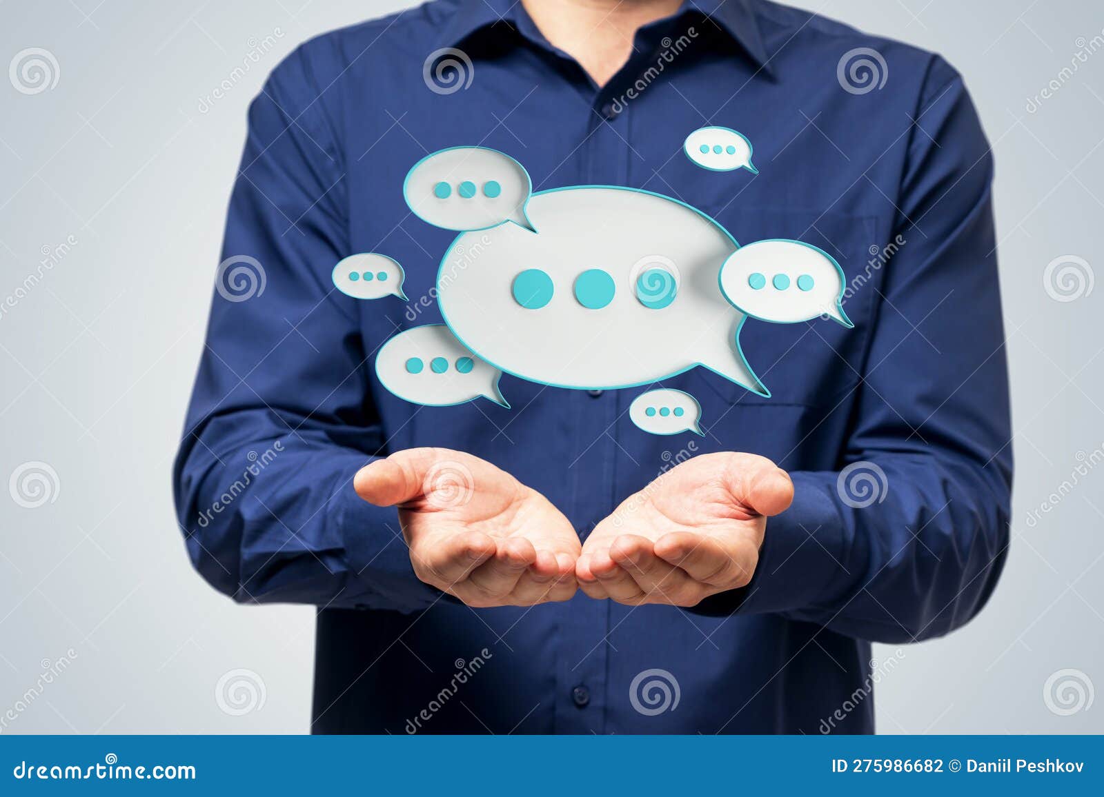 Close Up of Businessman Hands Holding Creative Blue Speech Bubble on ...