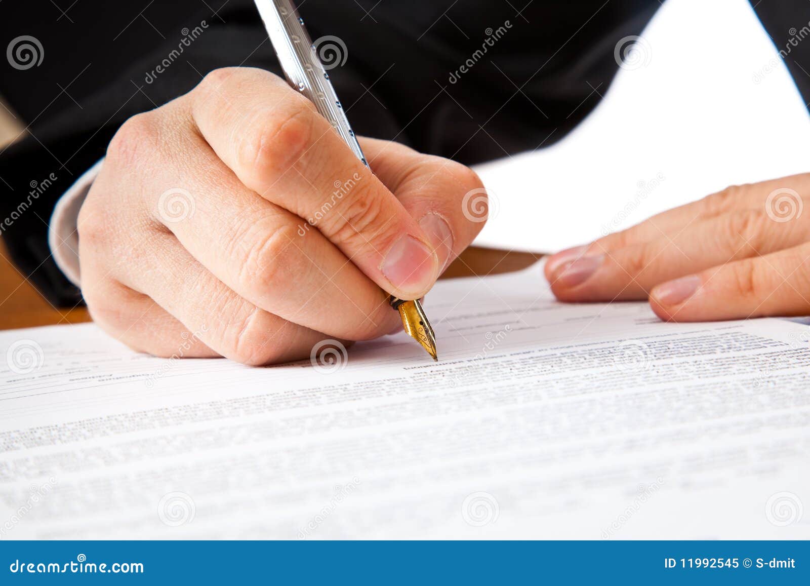 Close Up on a Businessman Hands Signing a Contract Stock Image - Image ...
