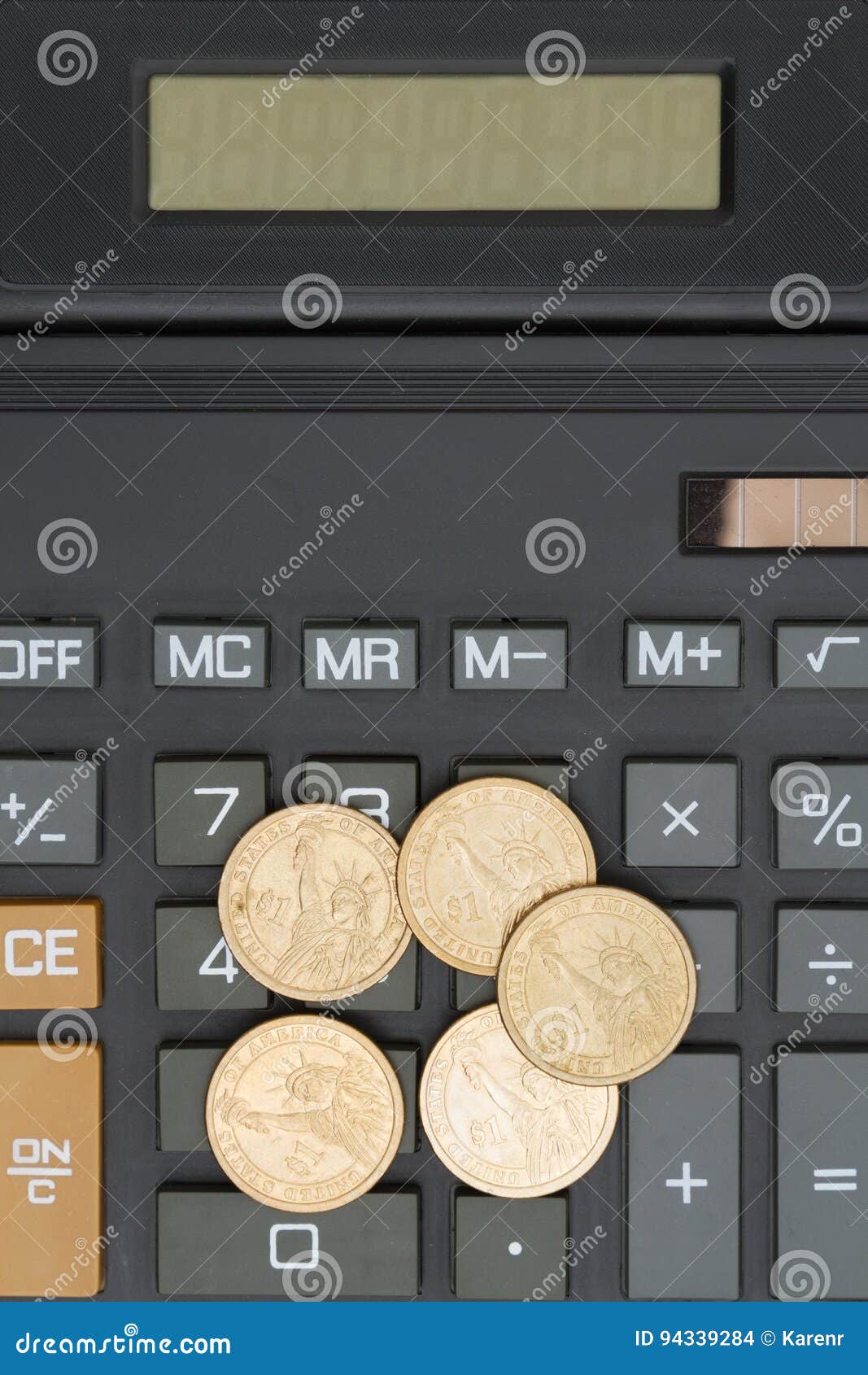 Close-up of a Calculator with Gold Coins Stock Photo - Image of screen ...