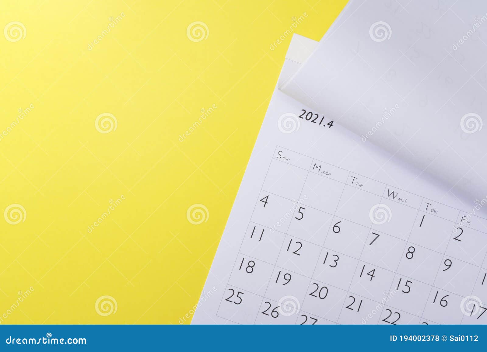 Close-up of a Calendar on a Yellow Background Stock Photo - Image of ...