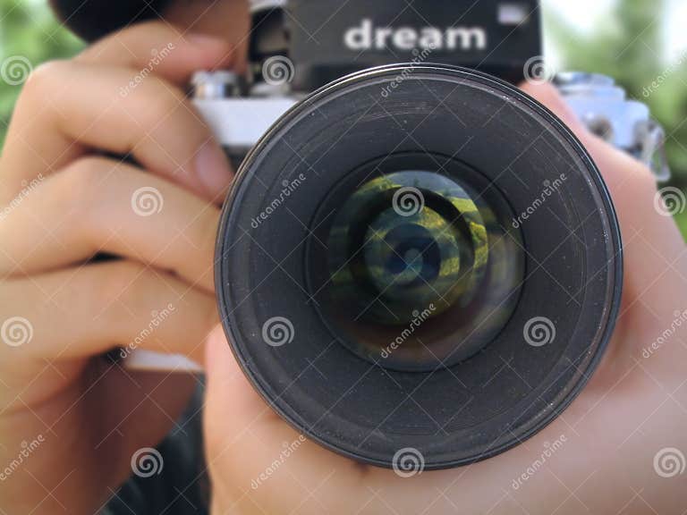 Close Up Camera stock image. Image of hands, spiral, reflection - 193839