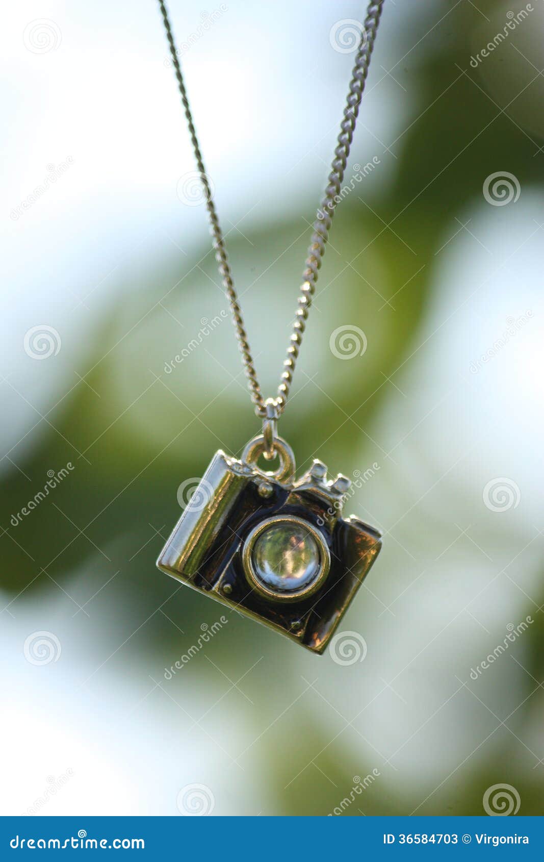 Close up of camera pendant stock image. Image of green - 36584703