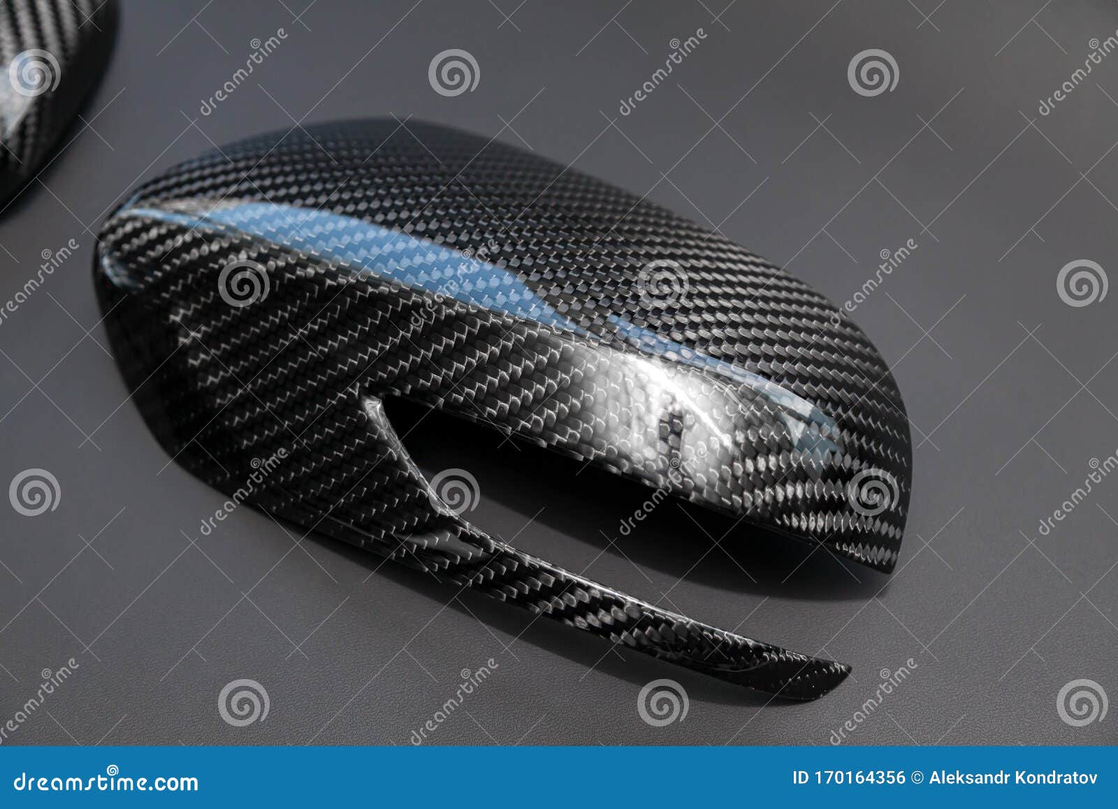 A Close-up on a Car Exterior Mirror Made from Carbon Fiber of ... A Close-up on a Car Exterior Mirror Made from Carbon Fiber of ...