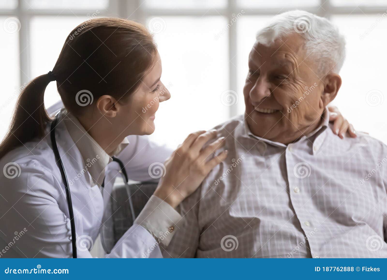 Close Up Caring Female Doctor Talking To Smiling Older Man Stock Photo ... Close Up Caring Female Doctor Talking To Smiling Older Man Stock Photo ...
