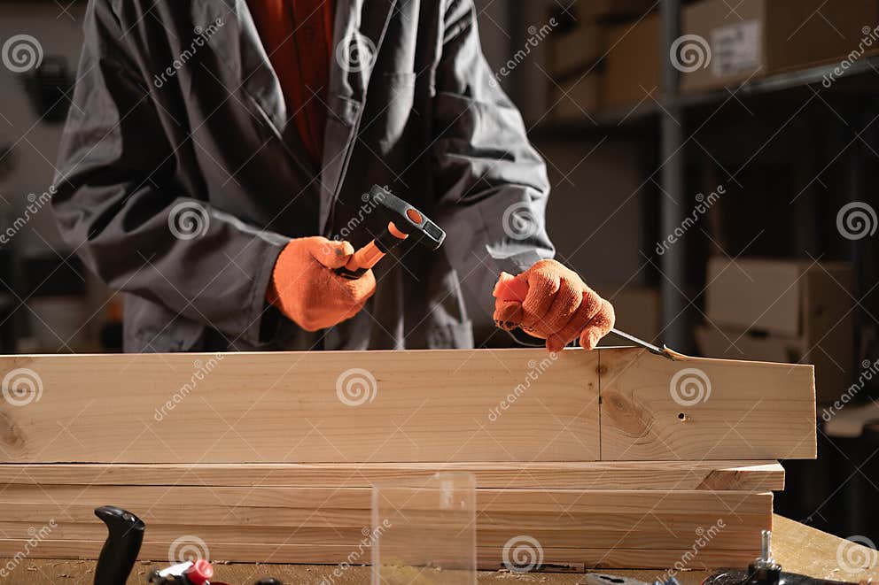 Close-up Carpenter Cutting Wooden Plank with Sharp Chisel and Hammer ...