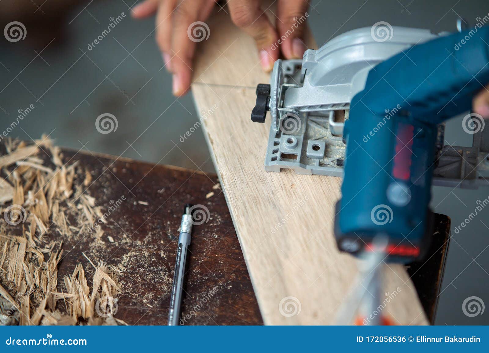 Close-up of a Carpenter Using a Circular Saw. Stock Photo - Image of ...