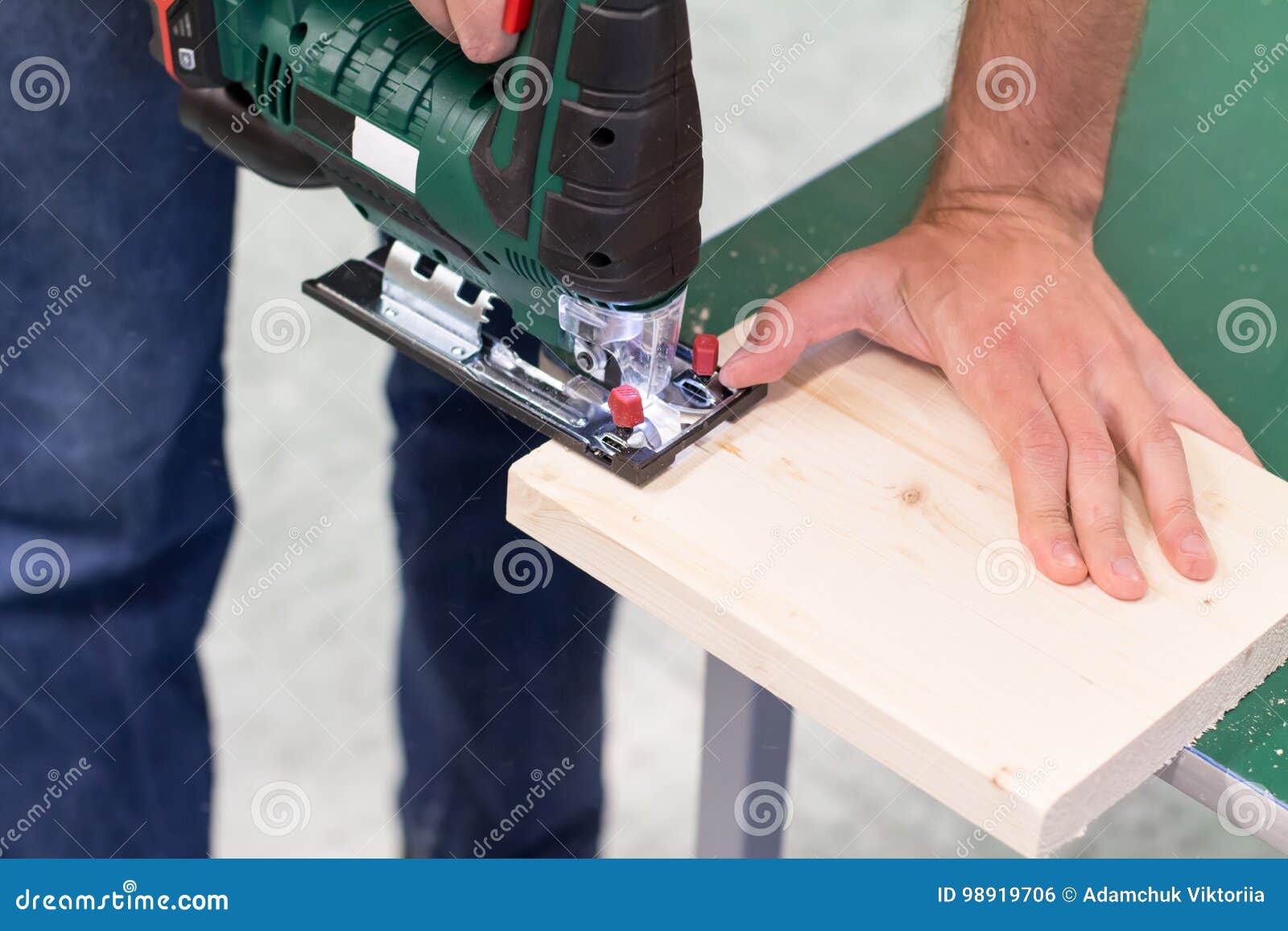 Close-up Carpenter Working with an Electric Jigsaw Stock Photo - Image ...