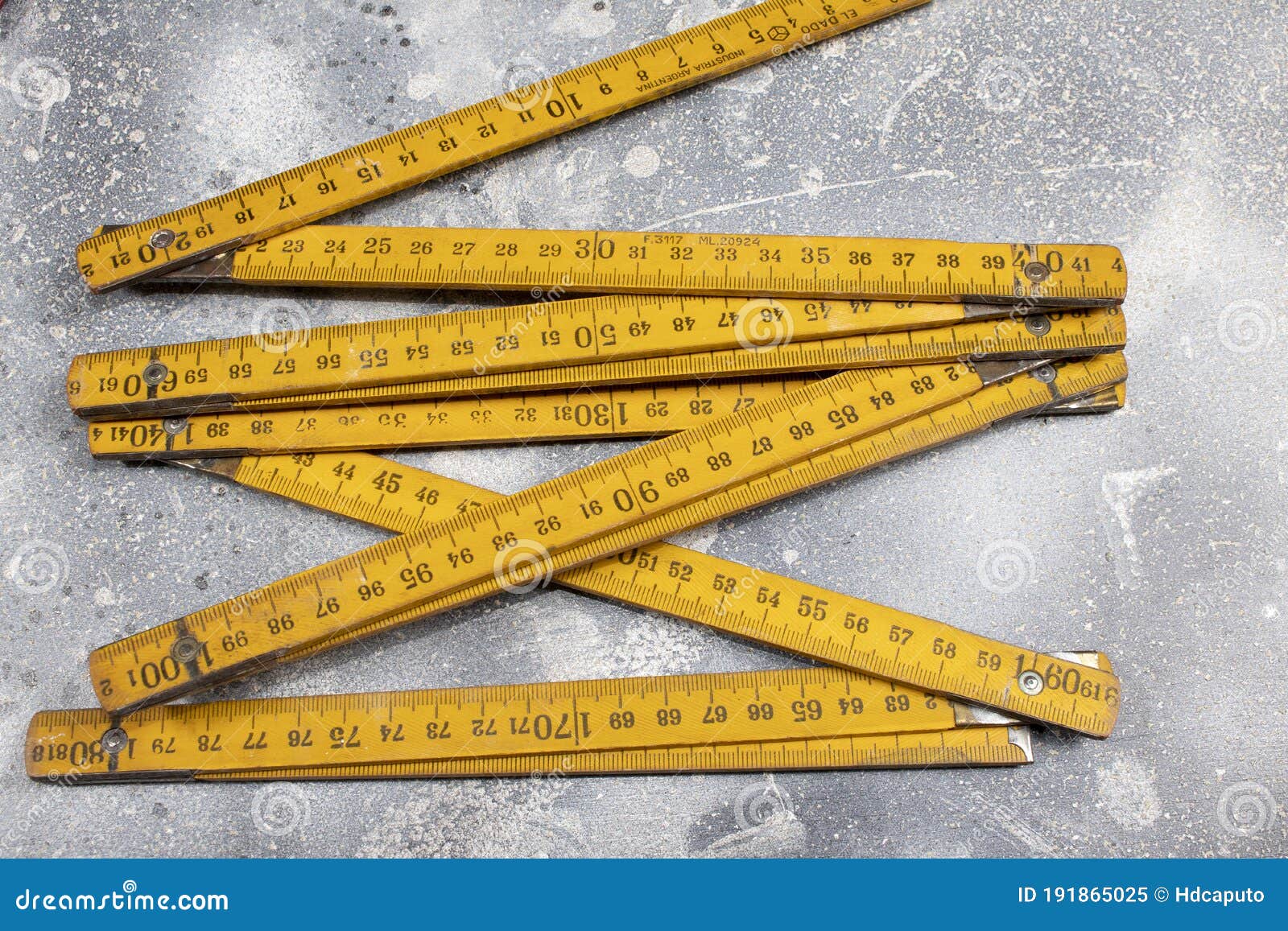 Close Up of a Carpentry Ruler on Cement Background with Clipping Path ...