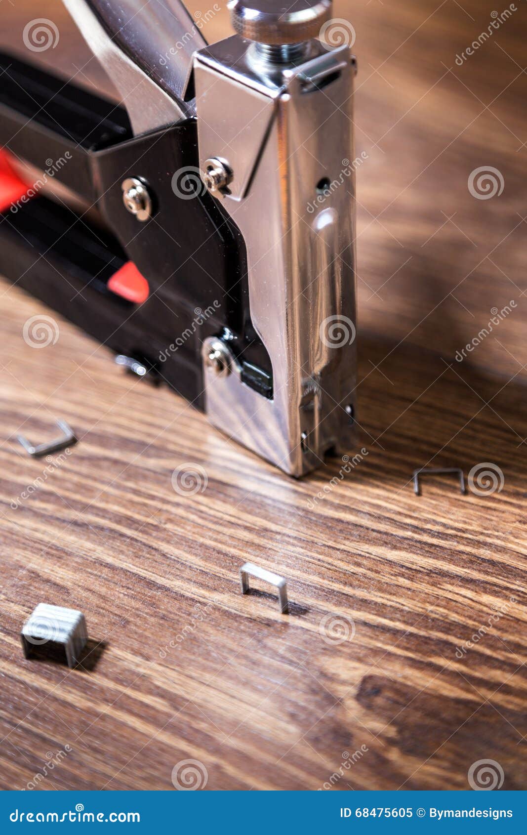 Close Up Carpentry Stapler With Staples On Wood Background Royalty-Free ...