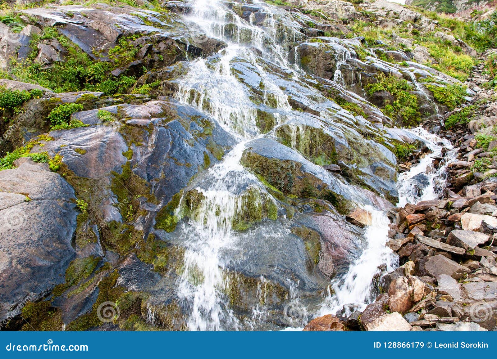 Close-up Cascade Mountain Waterfall in the Green Mountainside. Stock ...