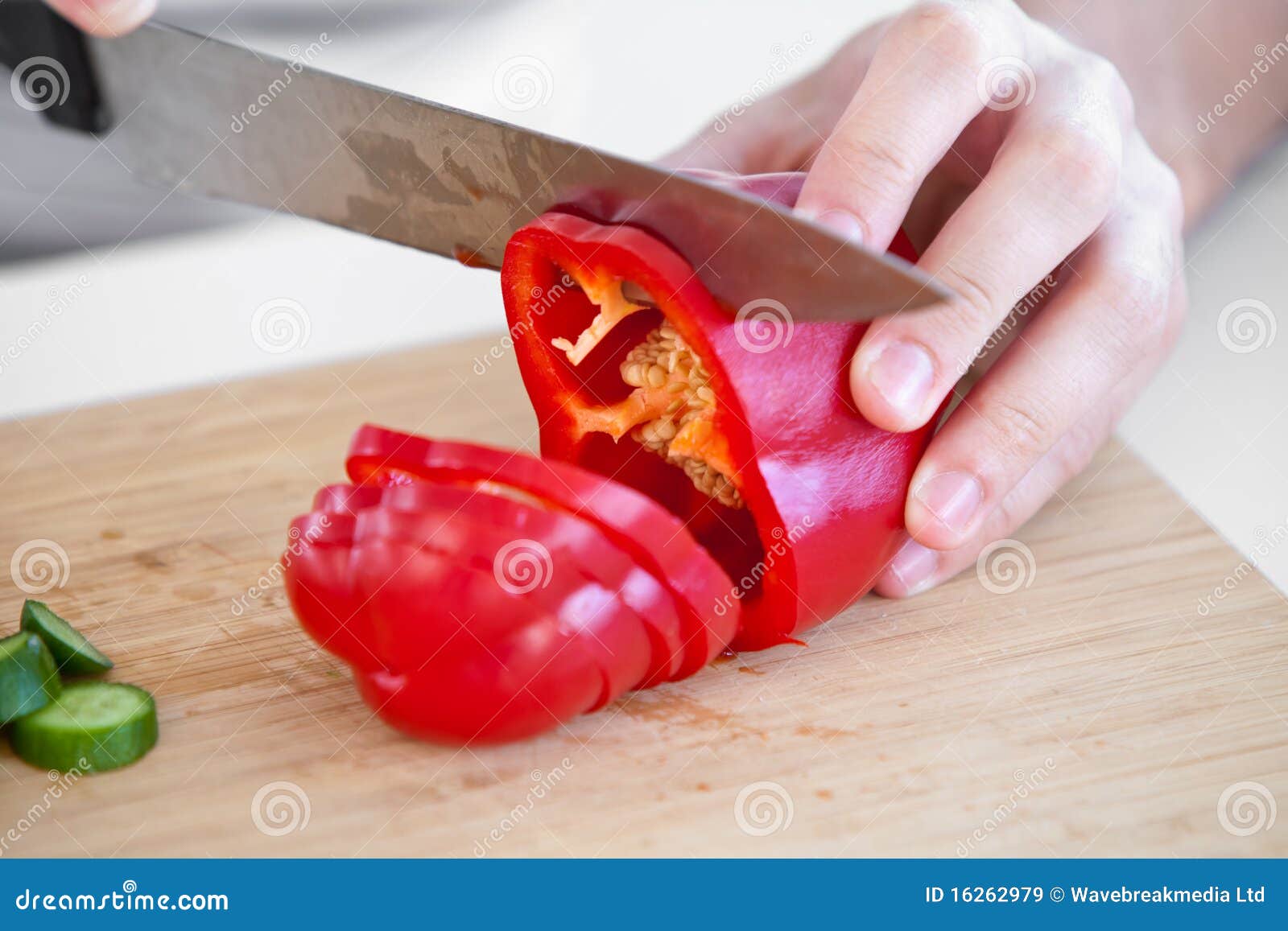 Close-up of a Caucasian Man Cutting Red Pepper Stock Image - Image of ...